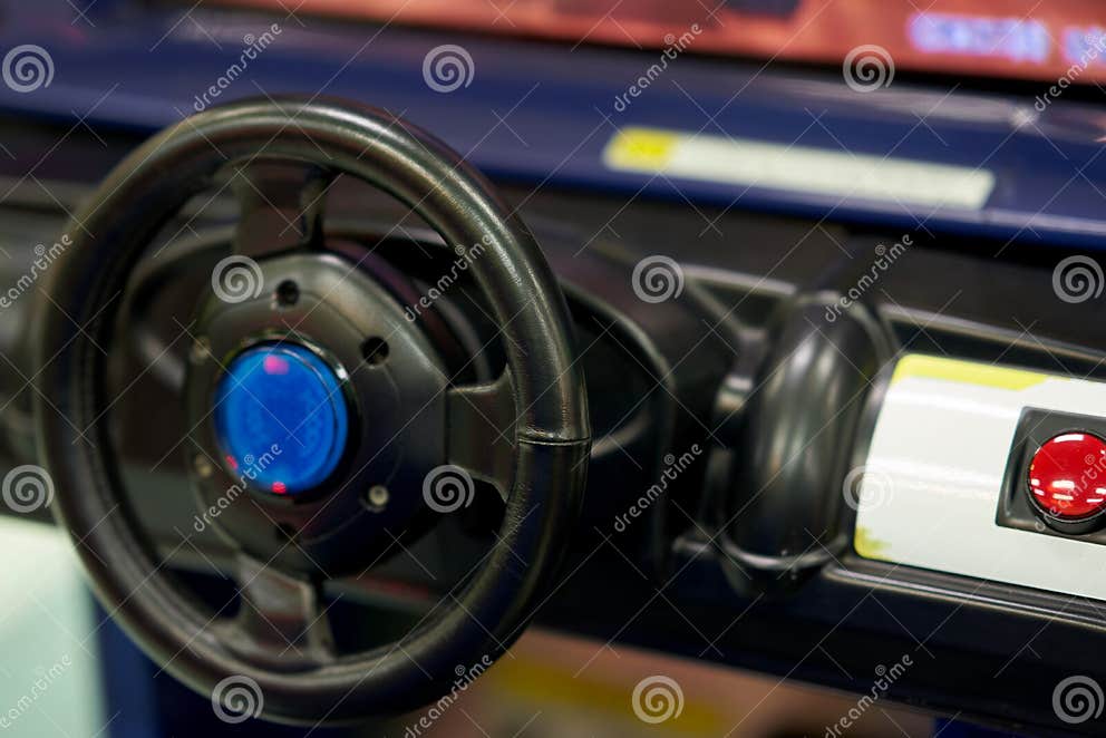 Car Steering of Console of Racer Game Machine in Game Arcade Stock ...