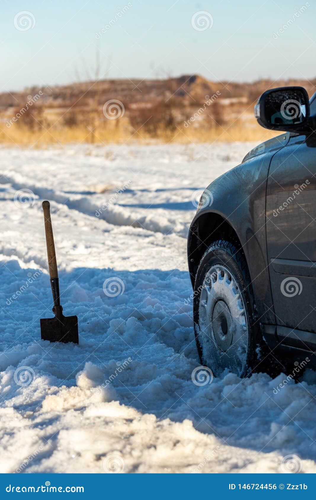 Car Stuck in Snow Offroad at Daylight with Shovel and Selective Focus ...