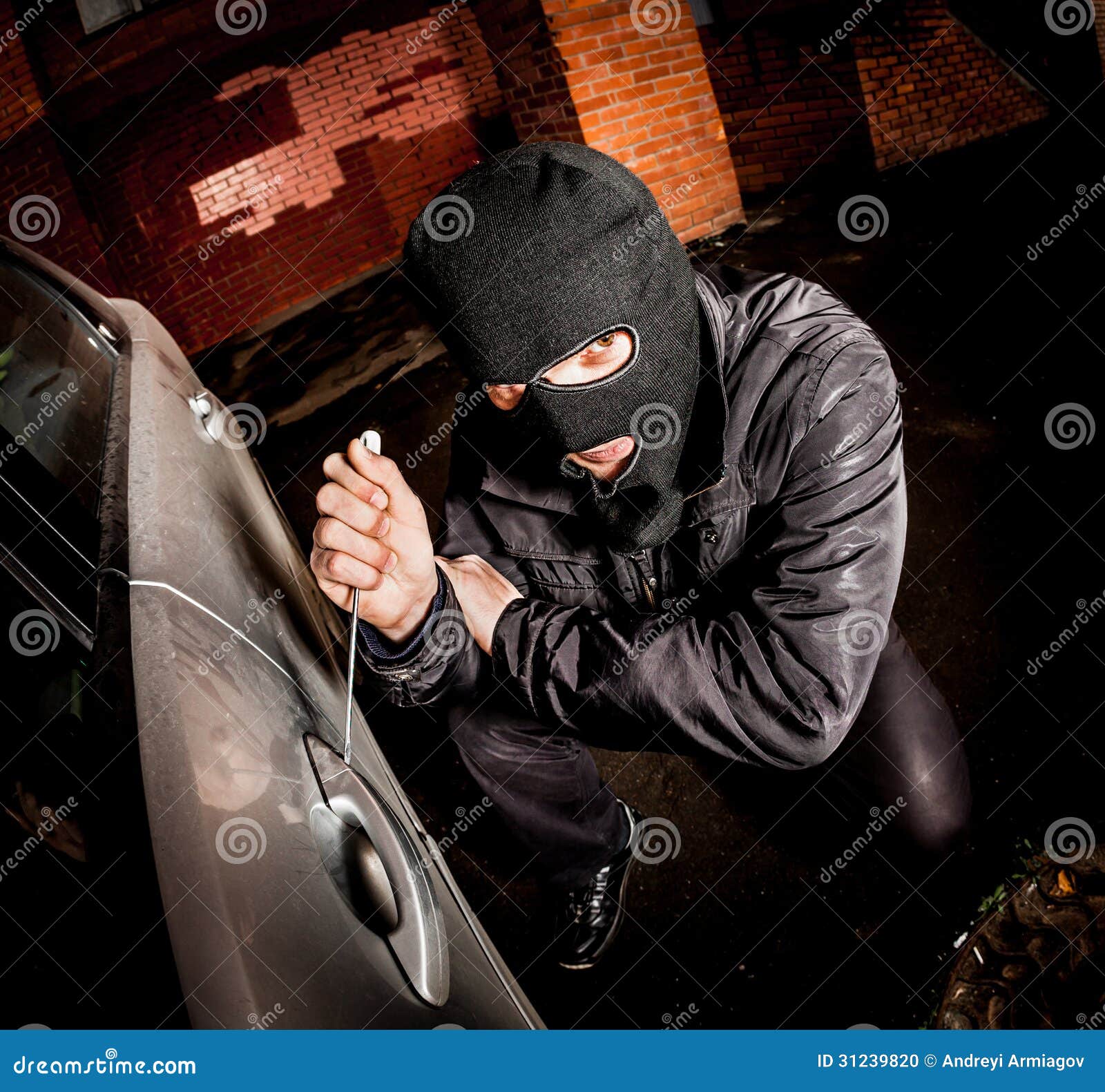 Car thief in a mask. stock photo. Image of lifestyles - 31239820