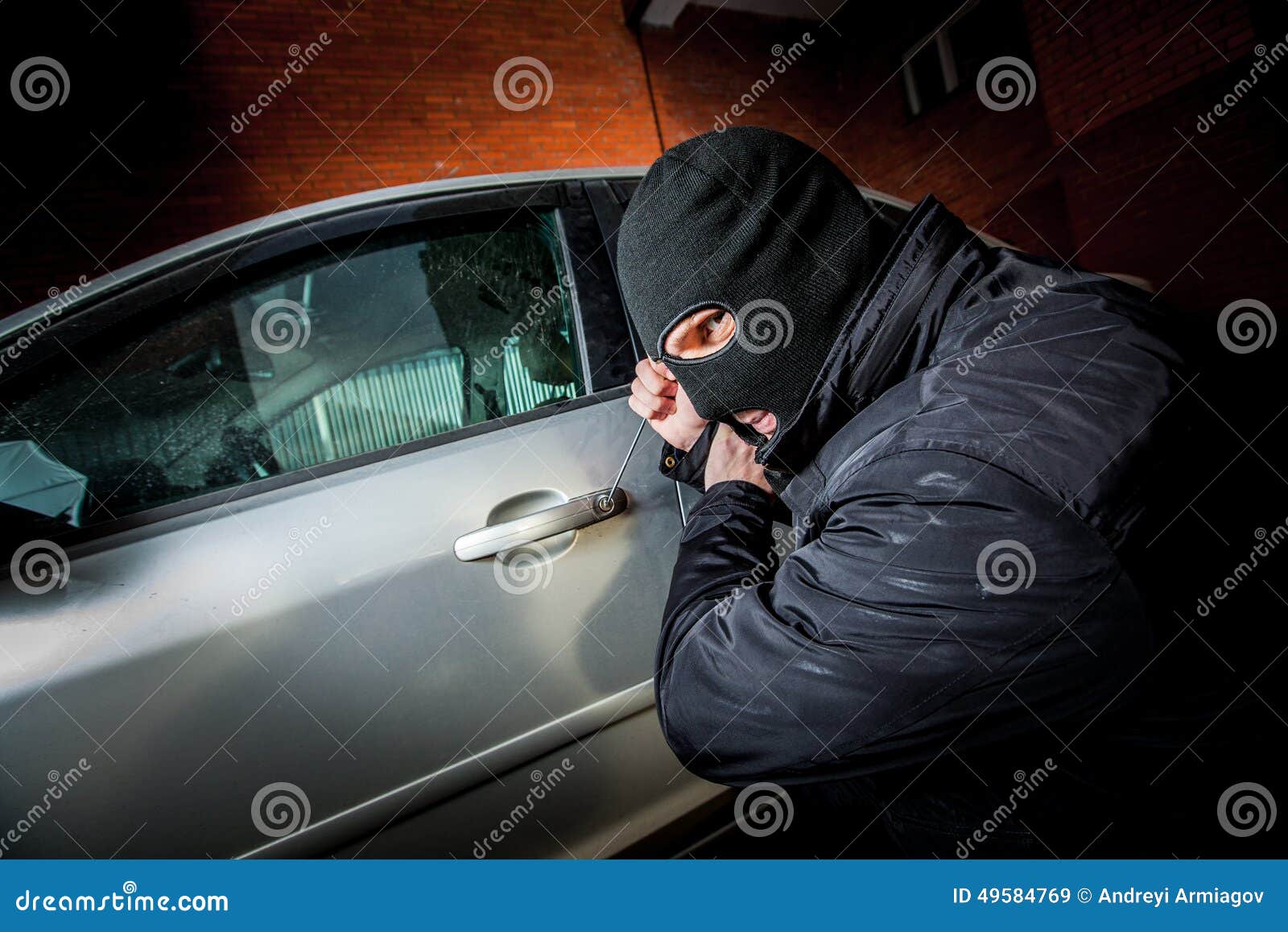 Car thief in a mask. stock image. Image of outdoors, hooded - 49584769
