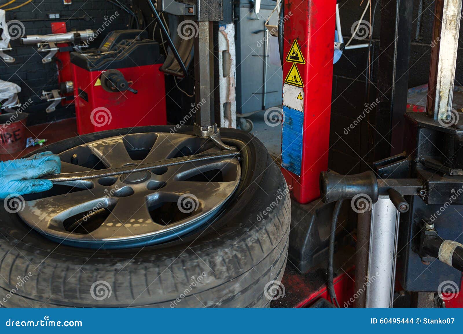 Car tire changing stock photo. Image of collar, industry - 60495444