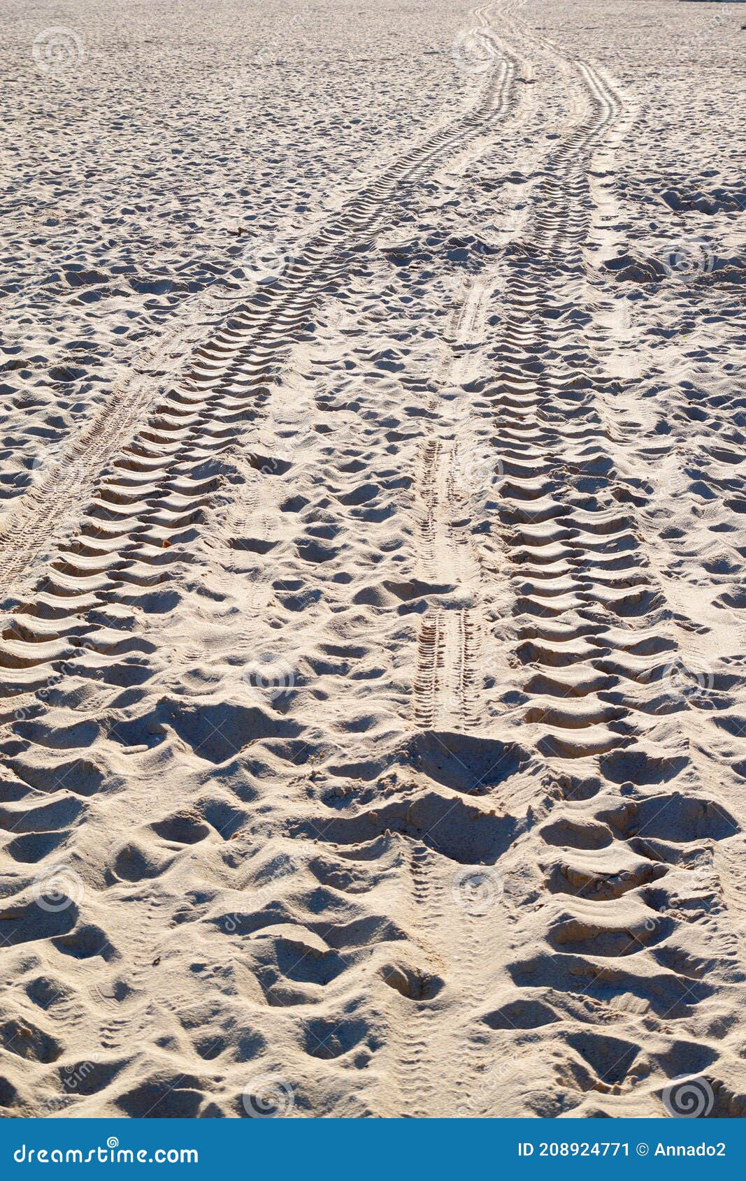 Car Tire Marks in the Sand Stretching into the Distance Stock Image ...