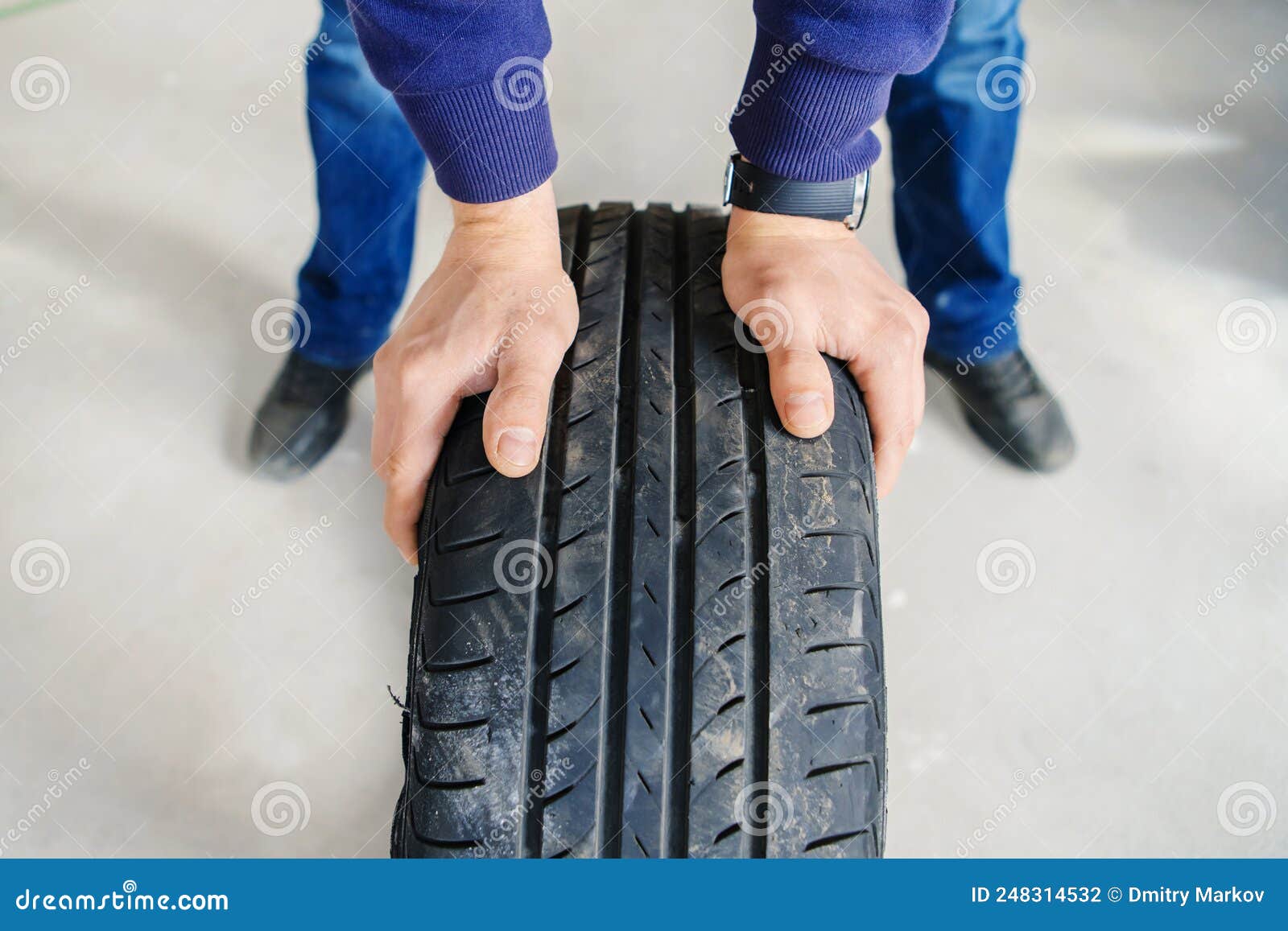 Car Tire. Replacement of Old Wheels with Worn Out Tread in a Car ...