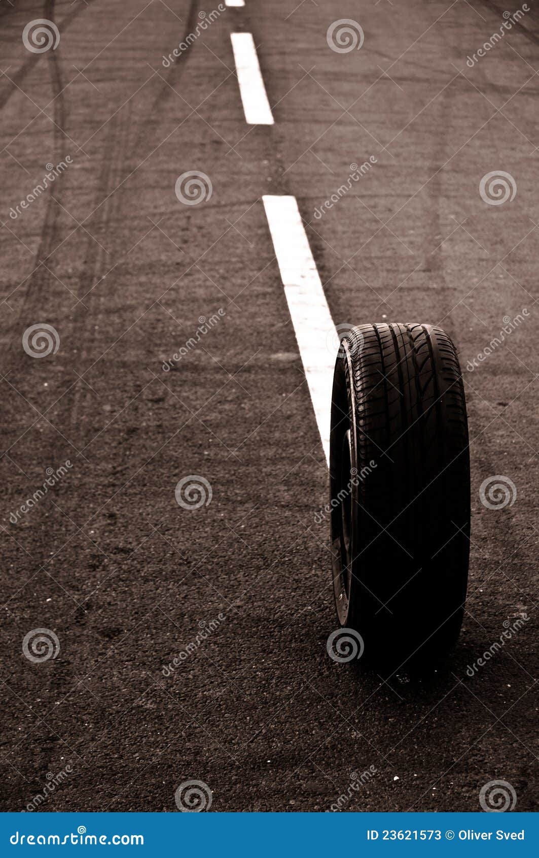 Car tire on the road stock image. Image of light, grey - 23621573