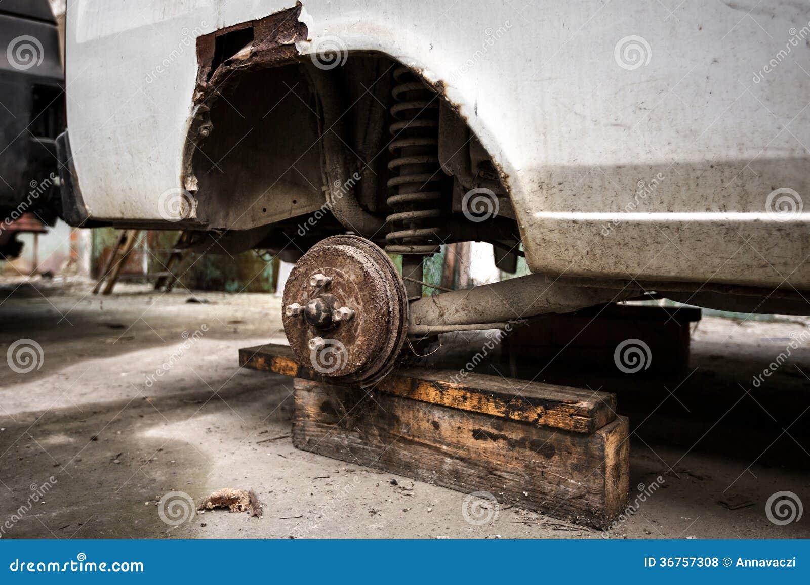 Car without tire stock photo. Image of lift, garage, indoors - 36757308