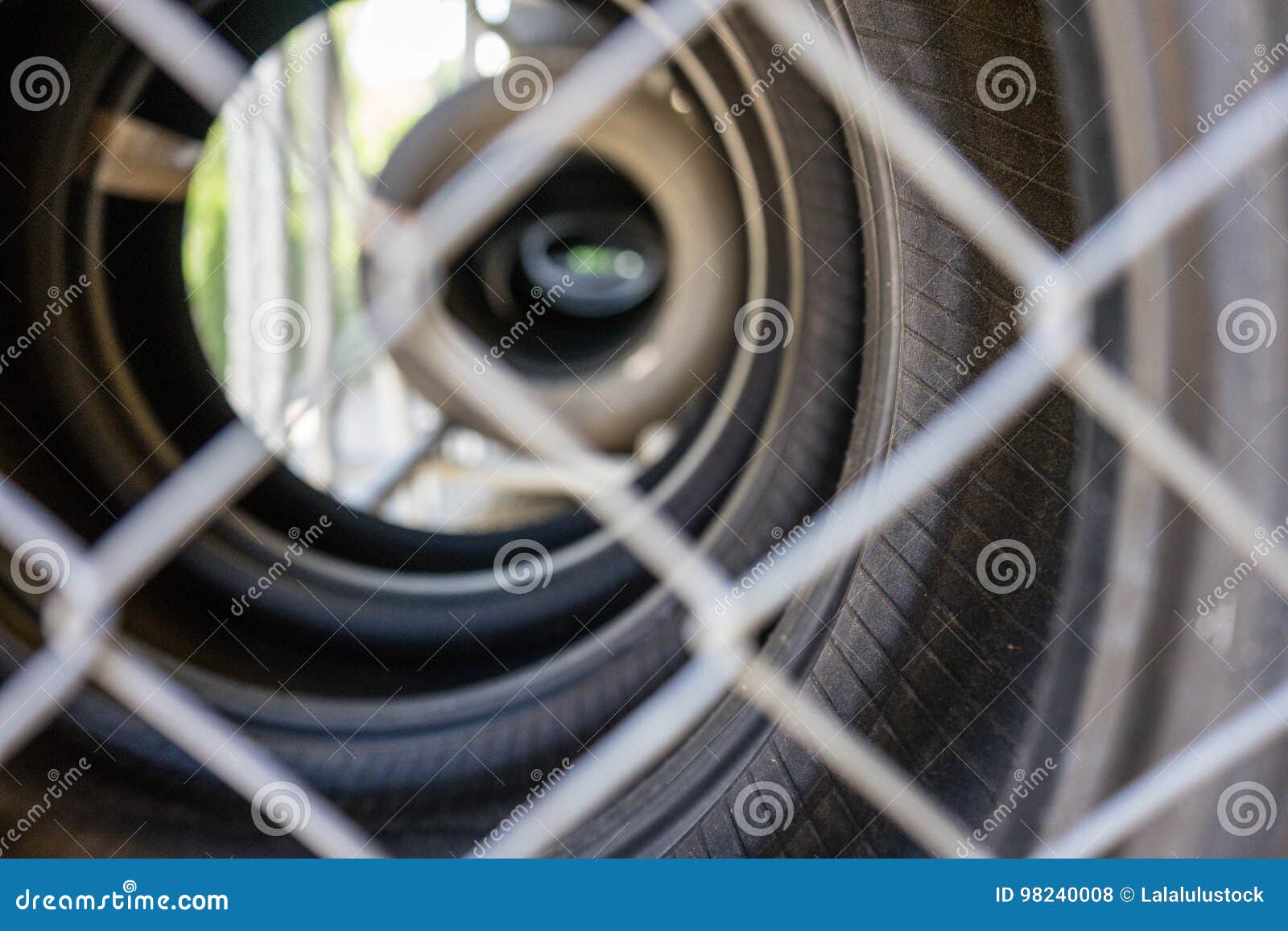 Car Tire Stack Seen through Fence Stock Photo - Image of formula ...