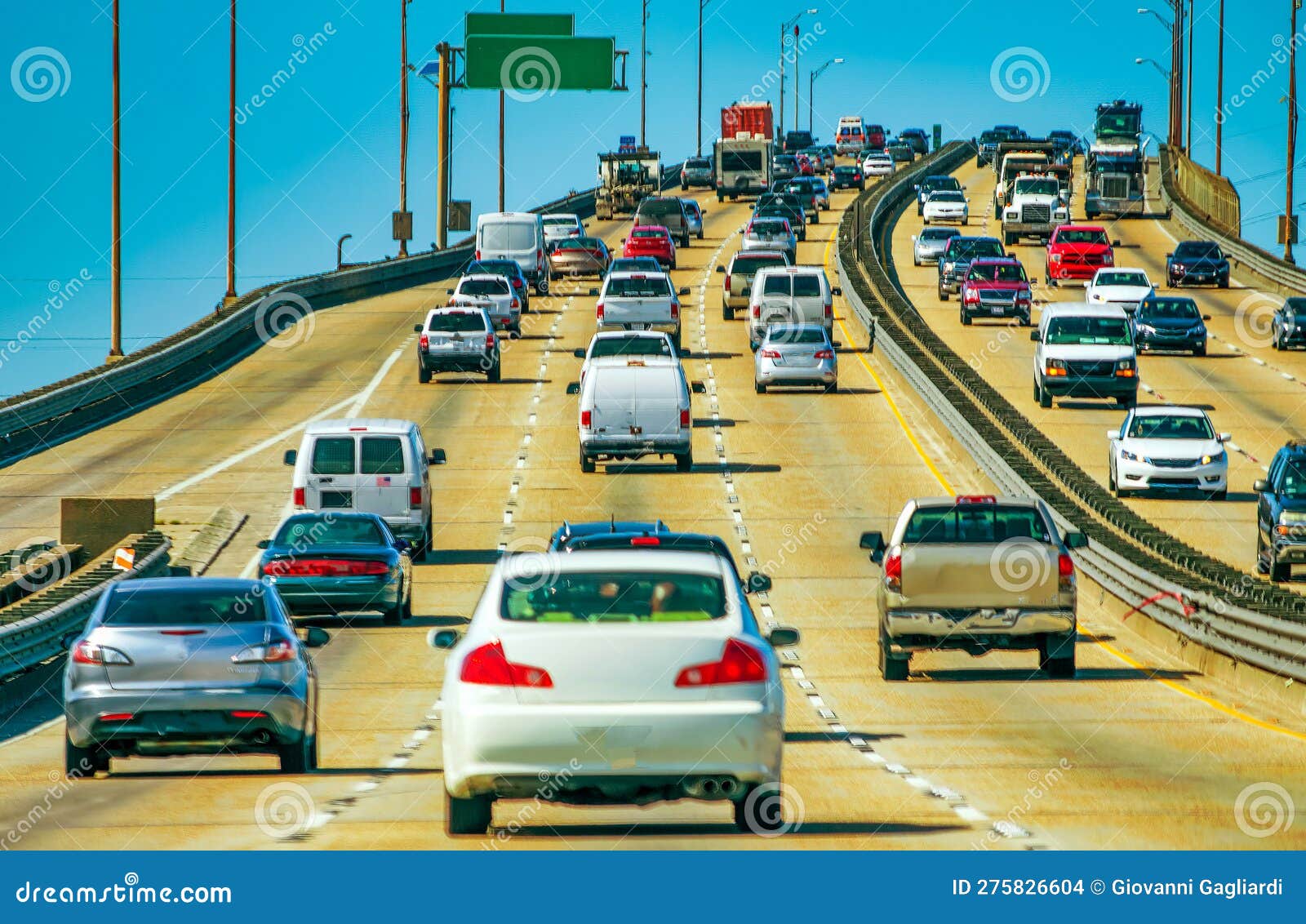Car Traffic Over a Major Bridge, Empty Road Signs on the Left Side ...