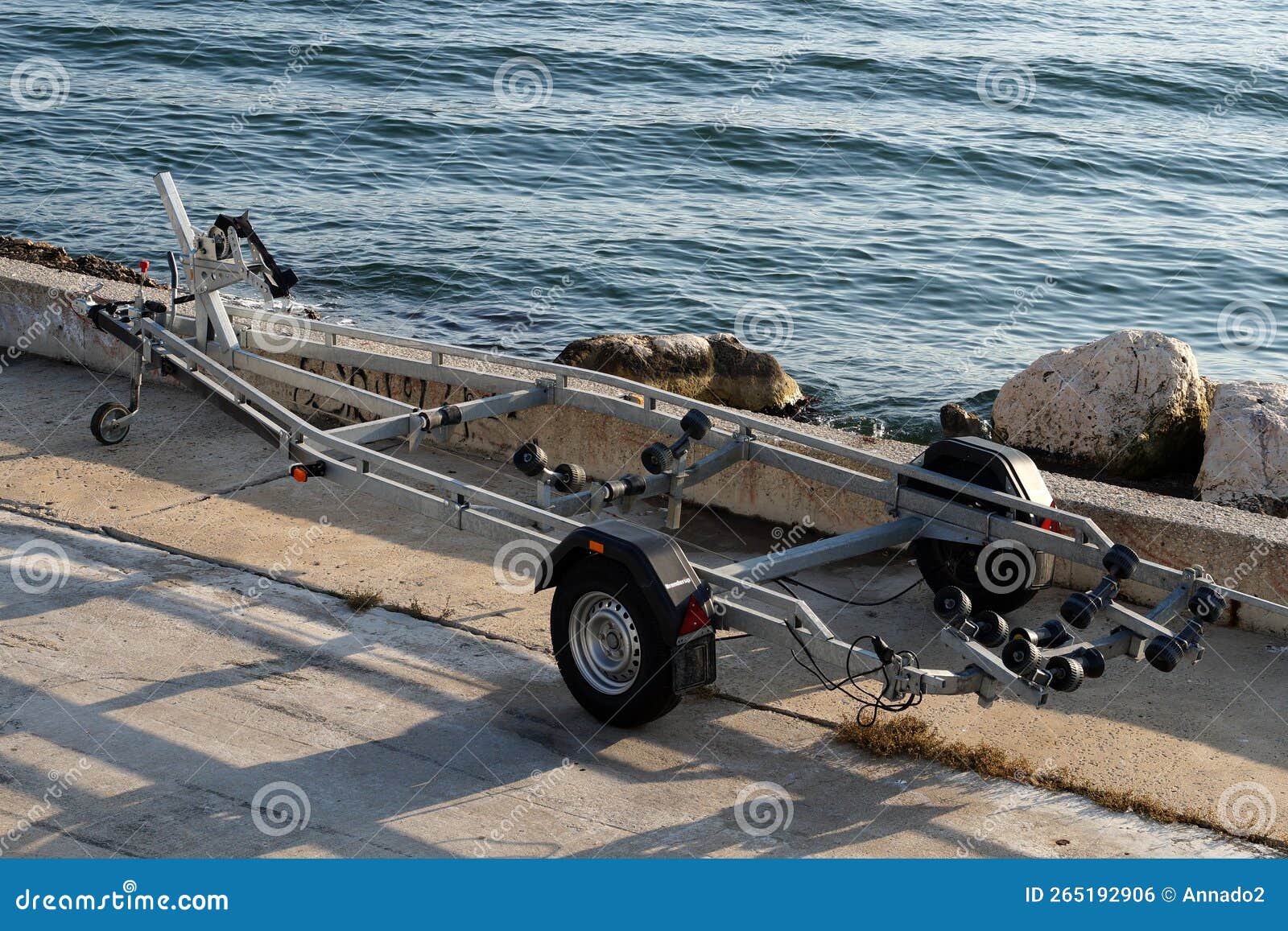 Car Trailer for Transporting Boats on the Sea Pier Stock Photo - Image ...