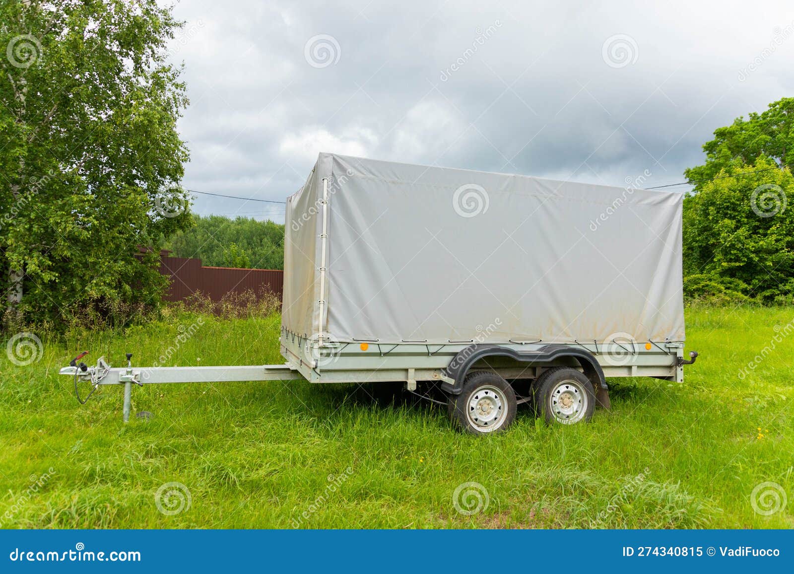 A Car Trailer with Two Axles is Parked Stock Image - Image of trailer ...