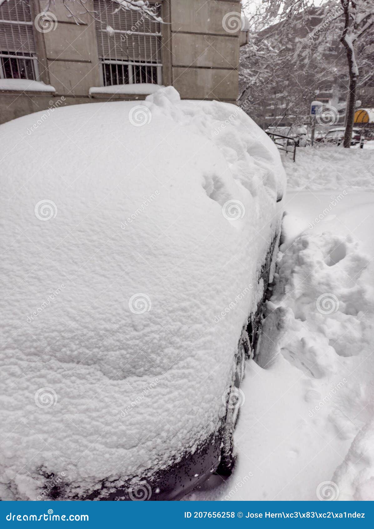 Car trapped in the snow stock photo. Image of disaster - 207656258