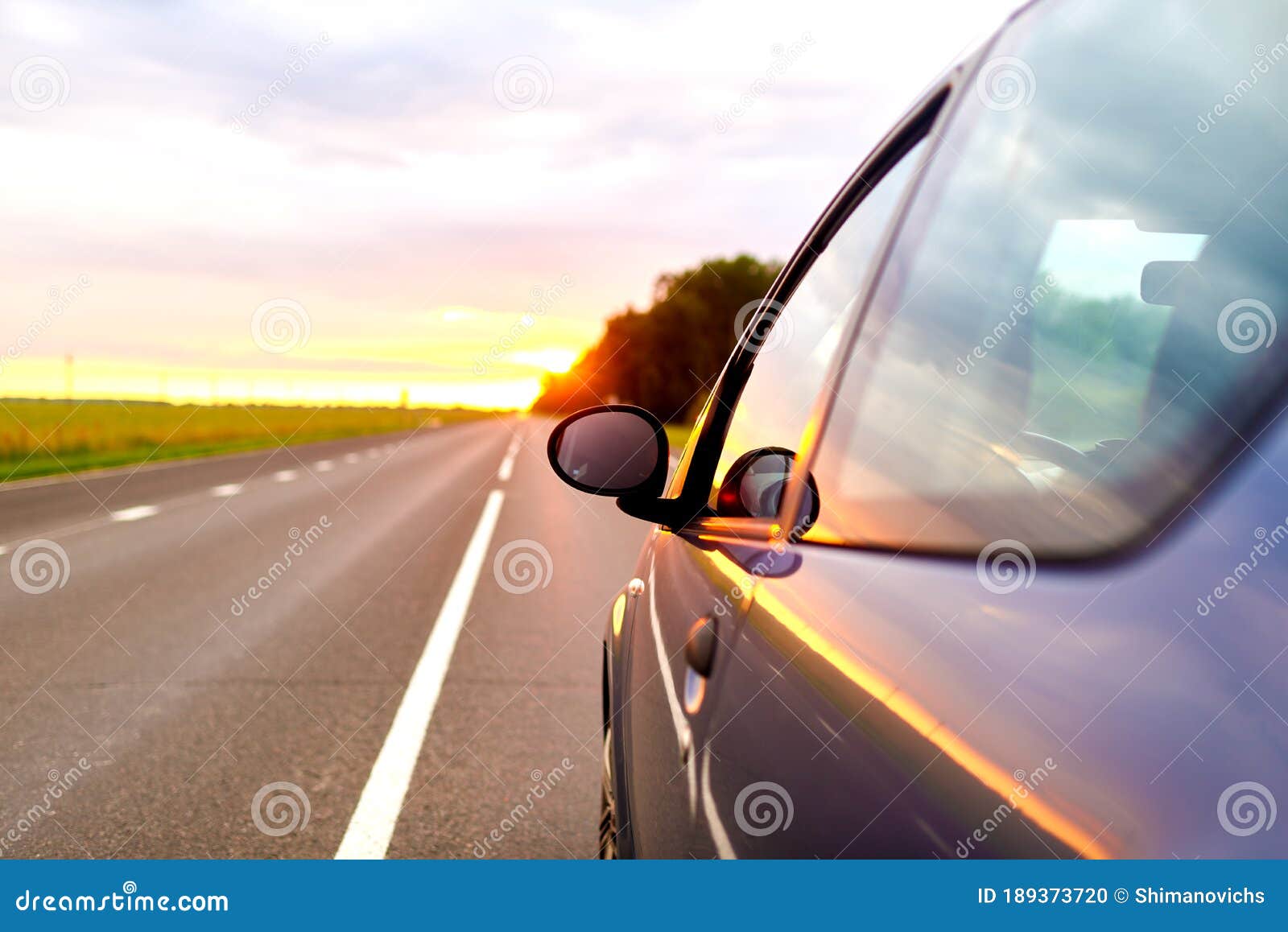 Car Trip Concept. Part of a Moving Car at Sunset. Stock Photo - Image ...