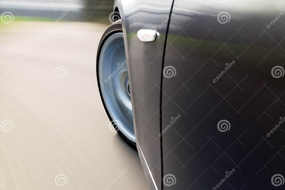 Car Turning Left at Speed stock photo. Image of speed - 19228926