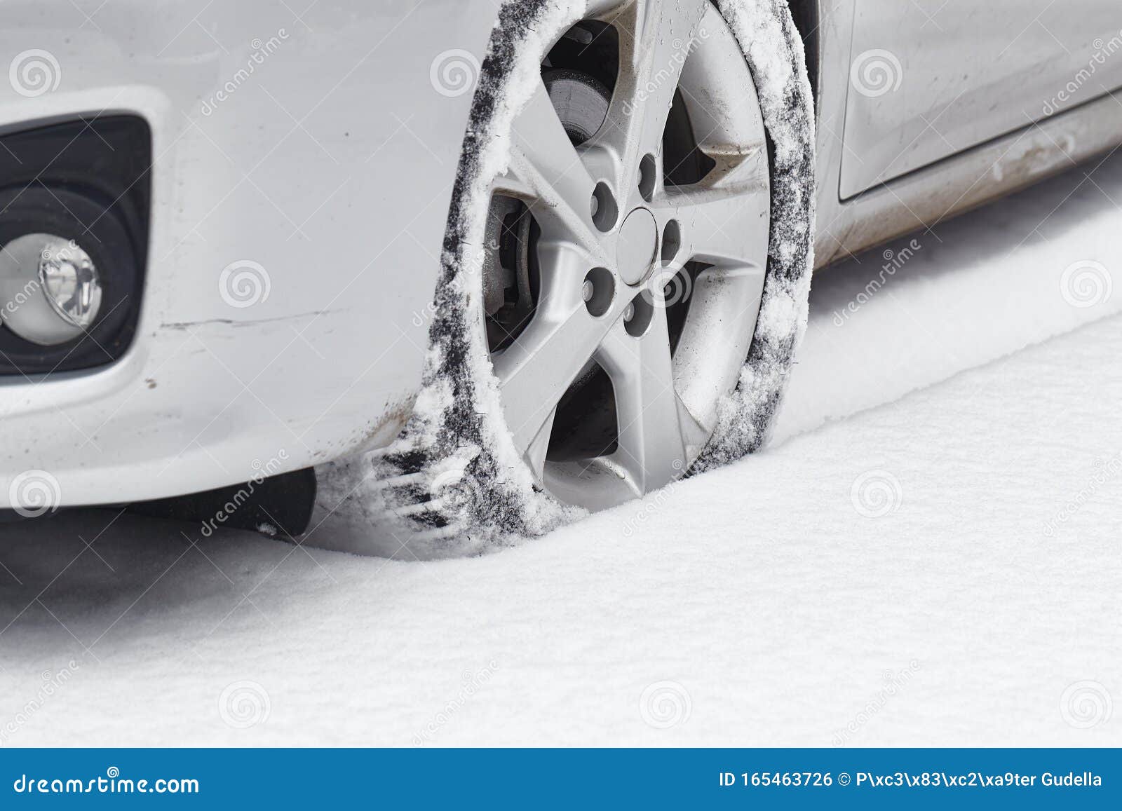Car tyre in snow stock photo. Image of condition, imprints - 165463726