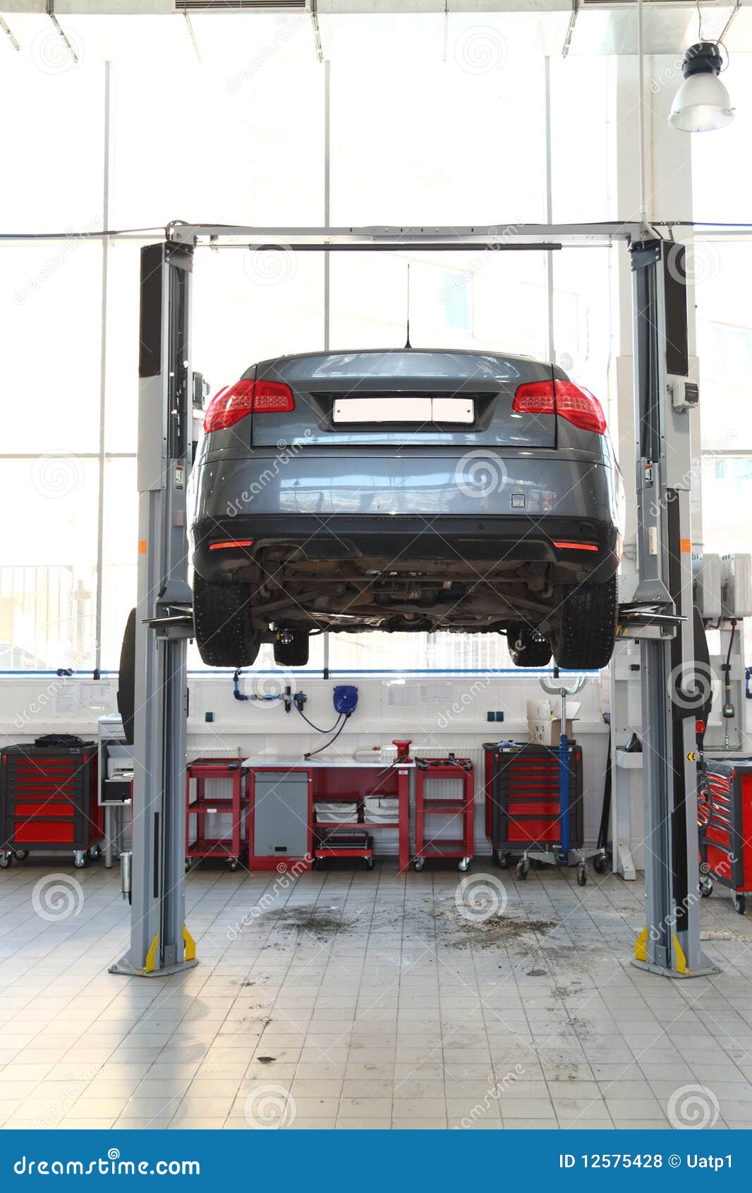 Car under repair stock photo. Image of wheel, business - 12575428