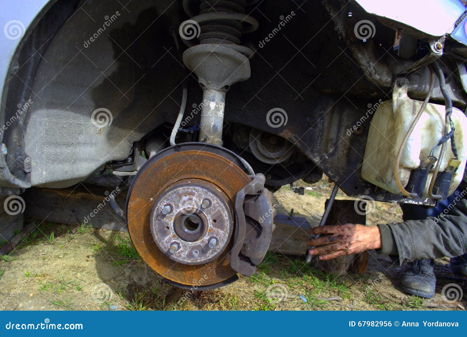 Car under repair stock photo. Image of craftsman, labor - 67982956
