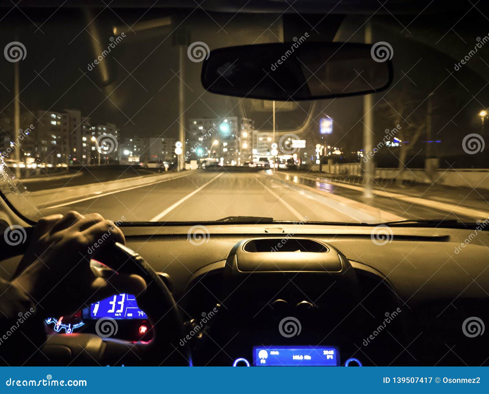 Car Use on Night Road. Man Holding Steering Wheel in Car Stock Image ...