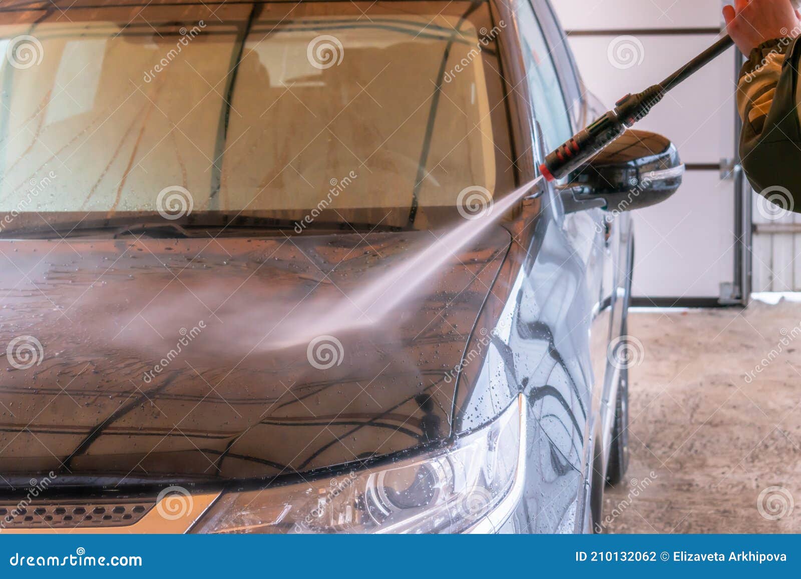 Car Wash with Karcher. the Man Washes the Black Car Stock Photo - Image ...