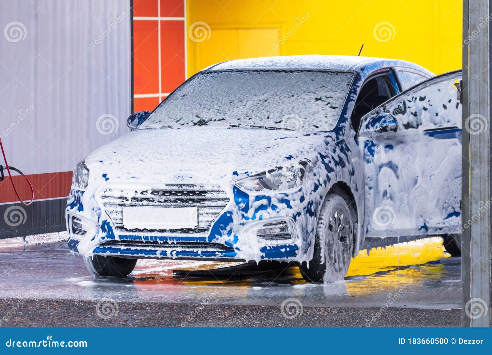 Car Wash with Open Door Covered in White Foam Stock Photo - Image of ...