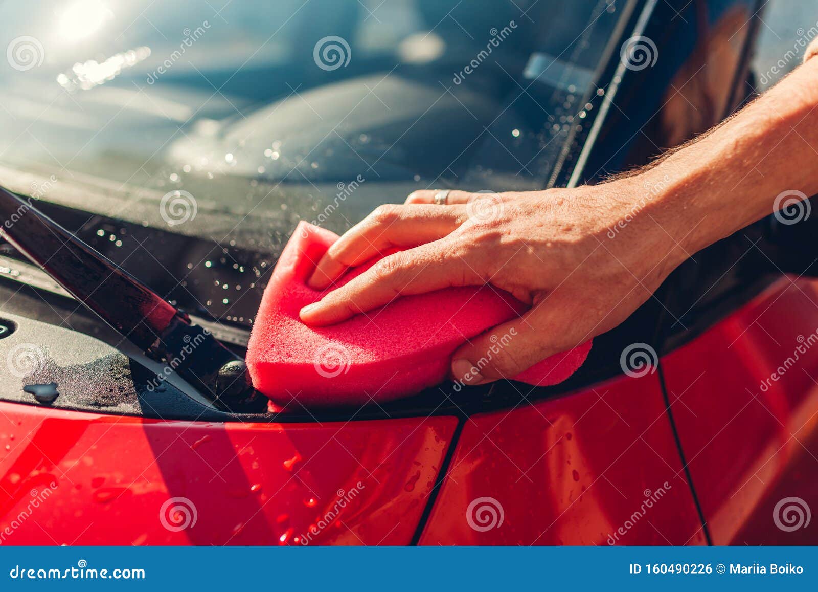 Car Washing. Man Cleaning Car with Soapy Sponge Outdoors. Close-up ...
