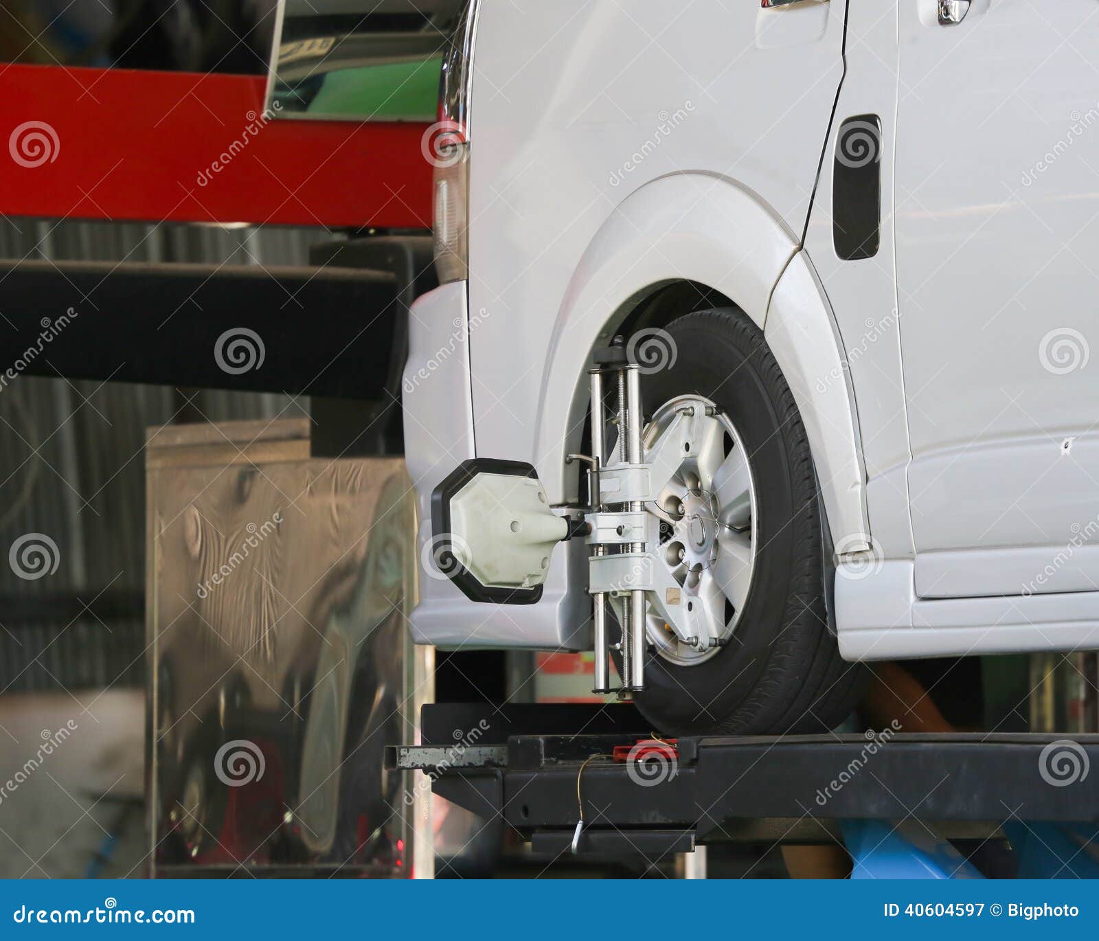 Car Wheel Fixed with Computerized Wheel Alignment Machine Clamp Stock ...