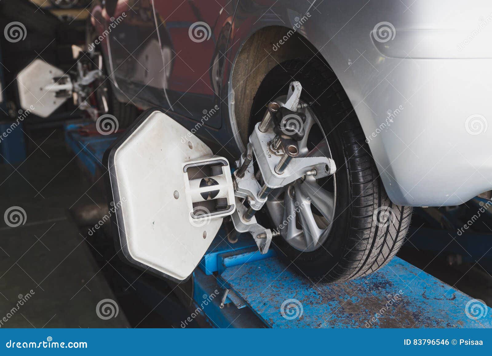 Car Wheel Fixed with Computerized Wheel Alignment Machine Clamp Stock ...