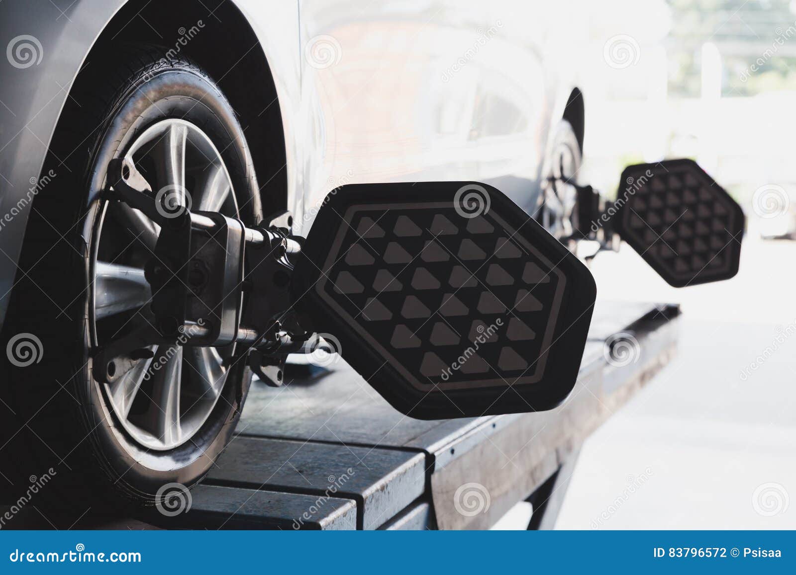 Car Wheel Fixed with Computerized Wheel Alignment Machine Clamp Stock ...