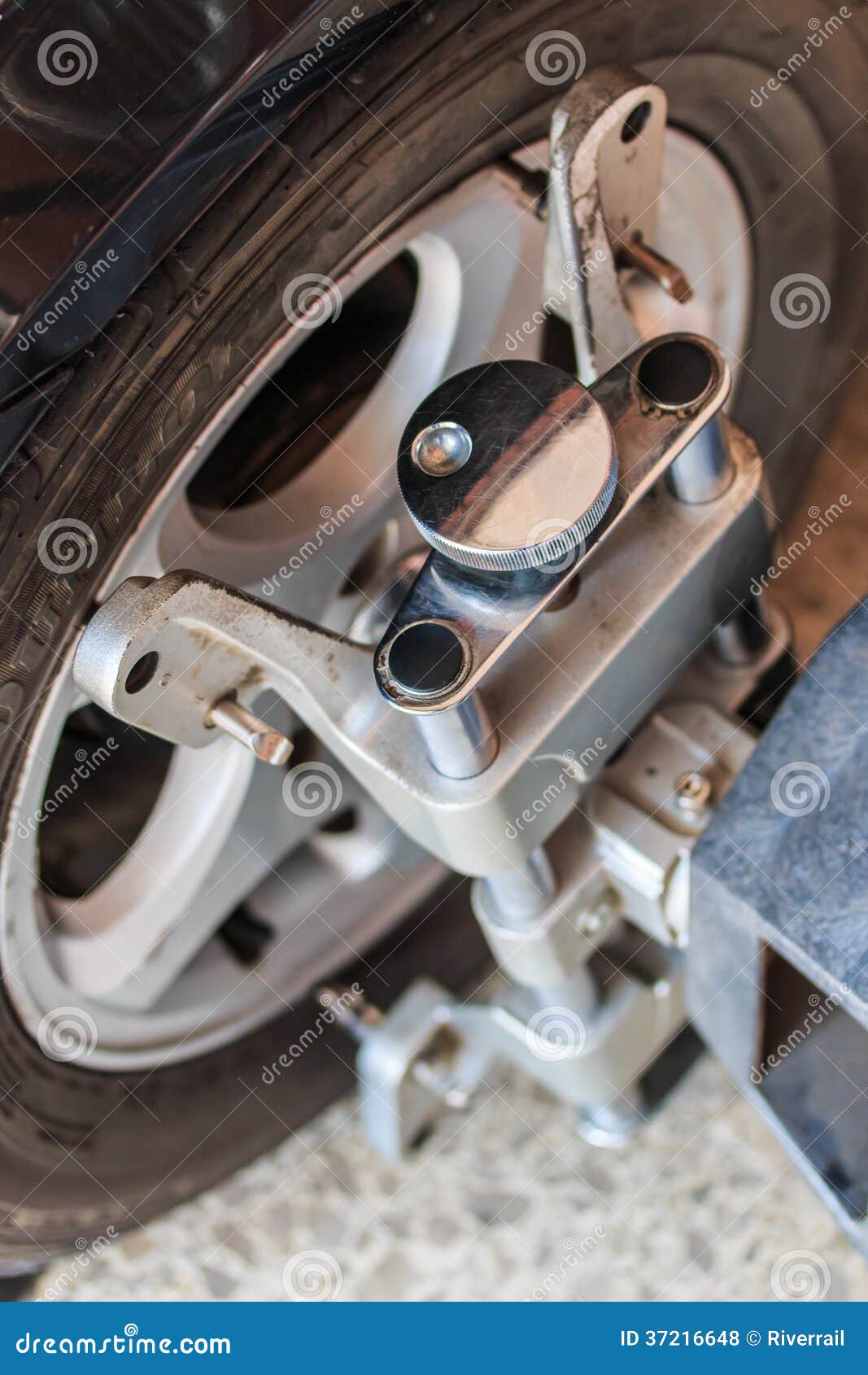 Car wheel fixing stock photo. Image of aignment, fixing - 37216648