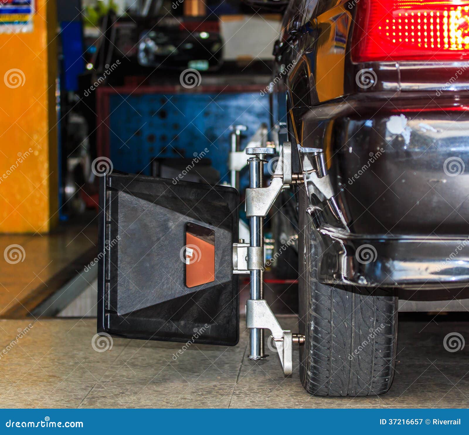 Car wheel fixing stock image. Image of fixing, industry - 37216657