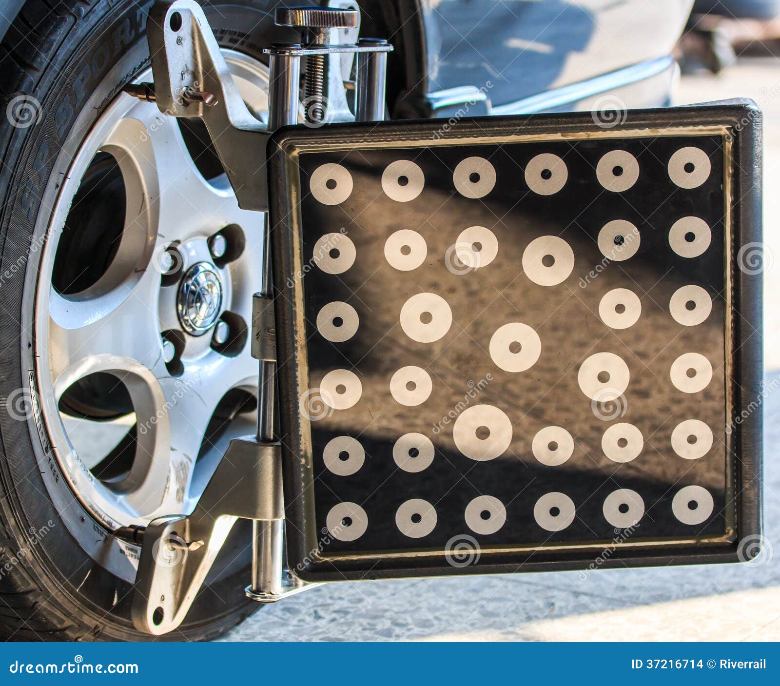 Car wheel fixing stock photo. Image of engineering, aligner - 37216714