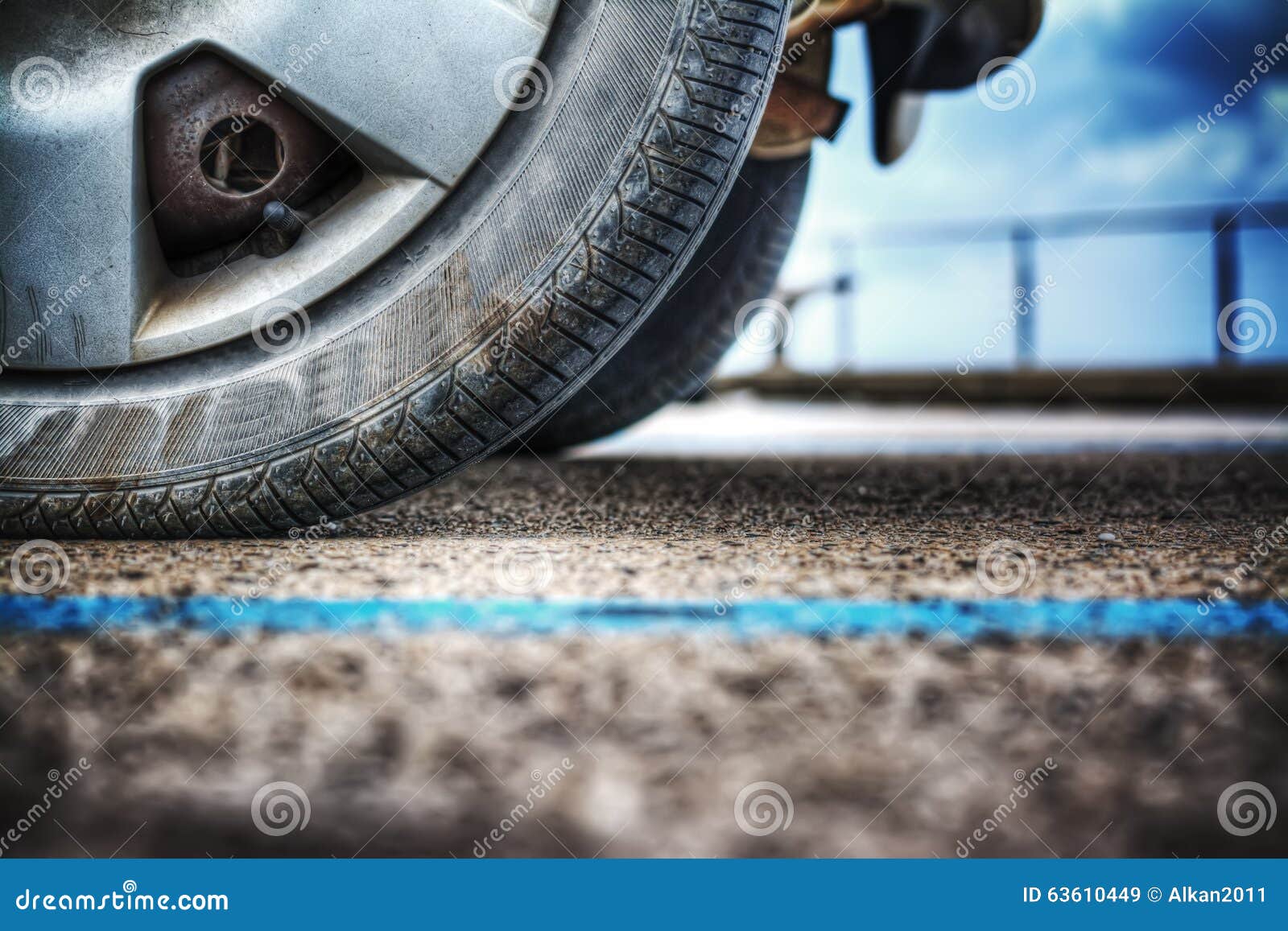 Car wheel on the ground stock image. Image of tyre, modern - 63610449