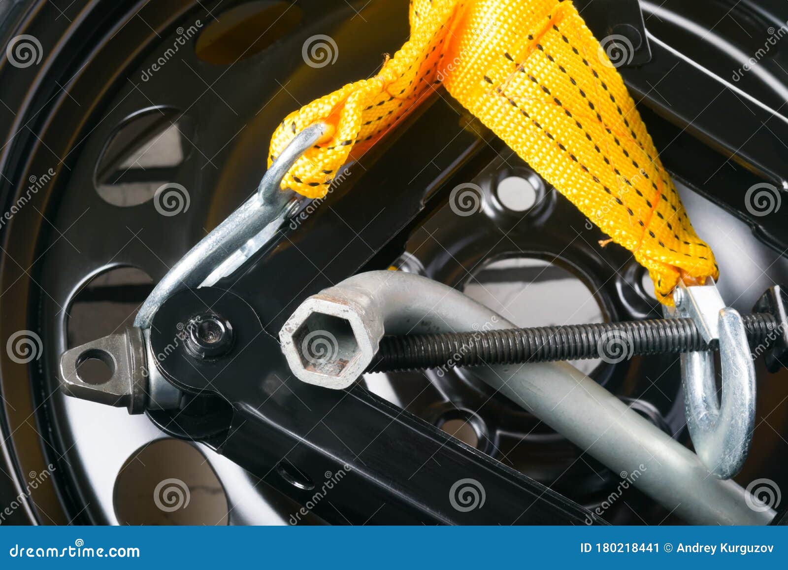 Car Wheel and a Set of Replacement Items, Jack and Key, Close-up Stock ...