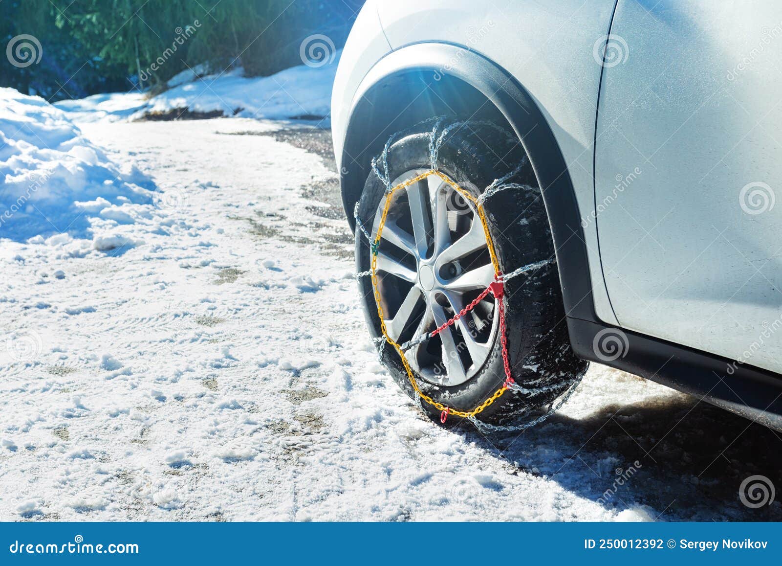 Car Wheel with Winter Chains for Snow and Ice Road on it Stock Photo ...