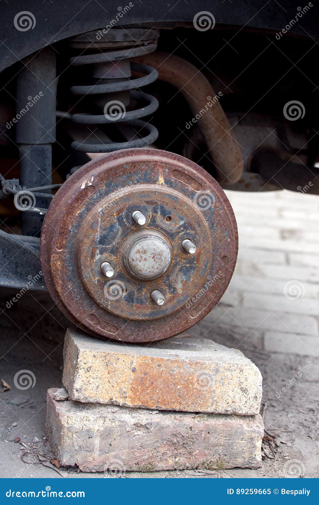Car without Wheels Costs on Brick. Stock Image - Image of disc, object ...