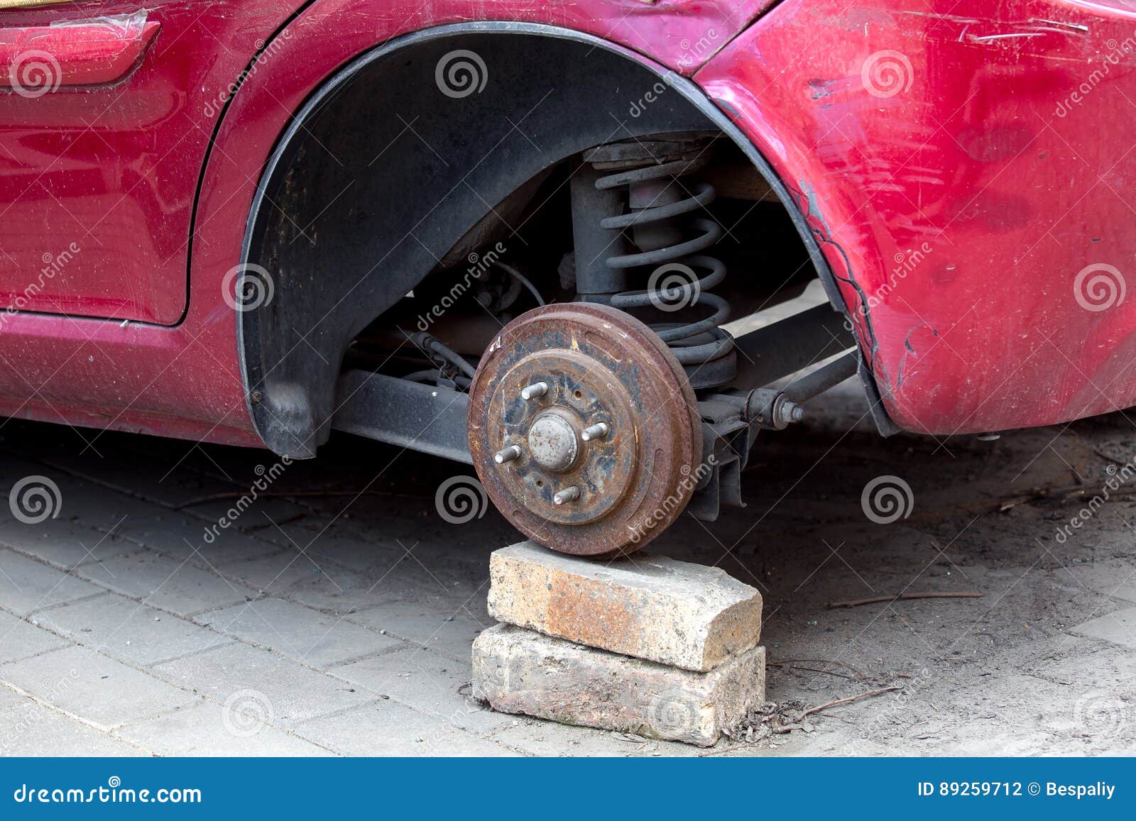 Car without Wheels Costs on Brick. Stock Photo - Image of maintenance ...