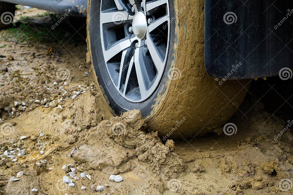 Car wheels stuck in mud. stock photo. Image of dirt - 201432236