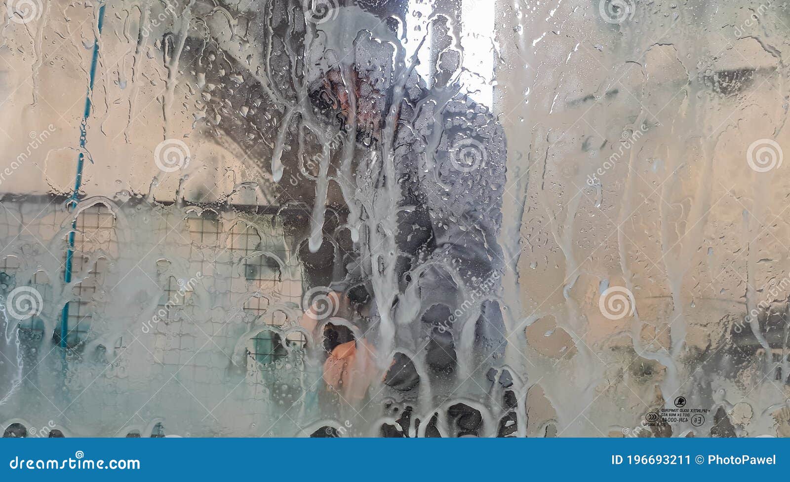 Car Window Covered Foam during Cleaning. Soap Sud on Windshield Stock ...