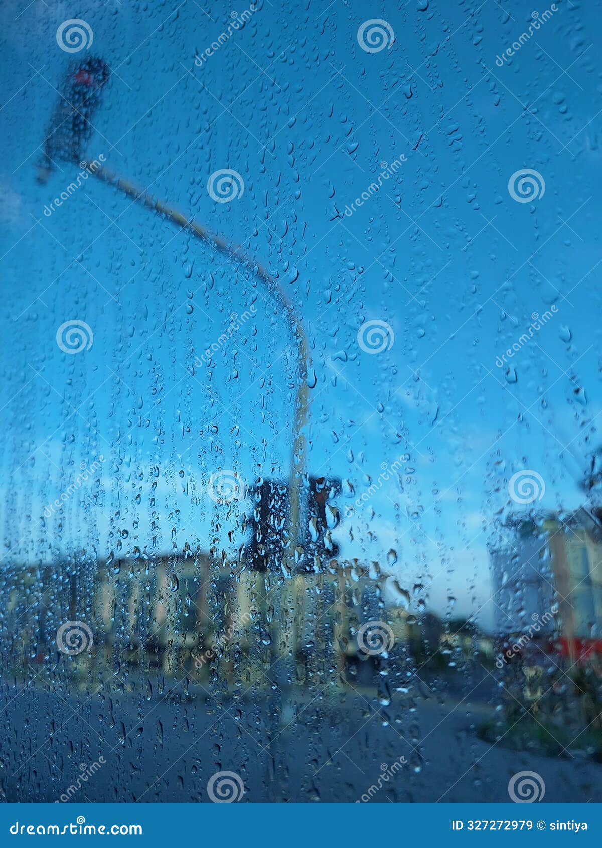 Car Window Glass with Raindrops at Traffic Light Intersection. Stock ...