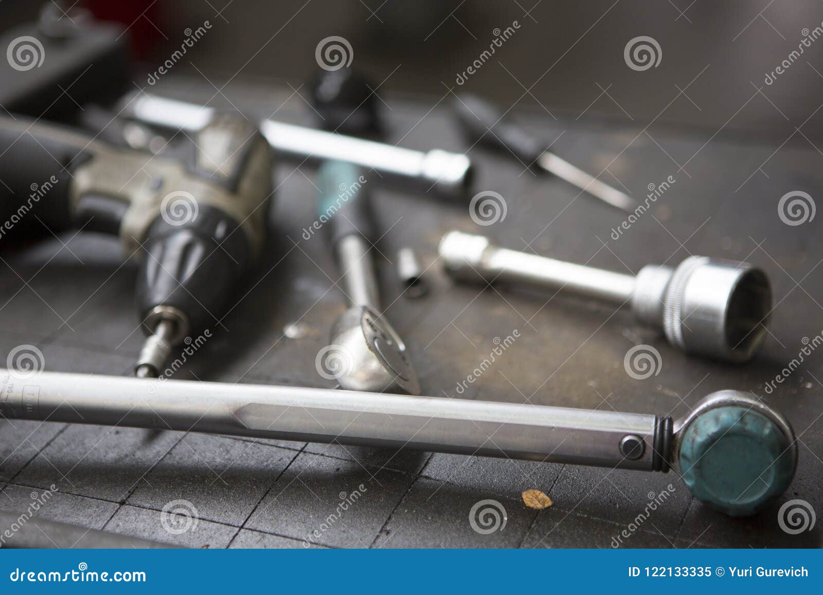 Car Workshop Tools Left Lying Around on the Floor. Workshop Floor ...