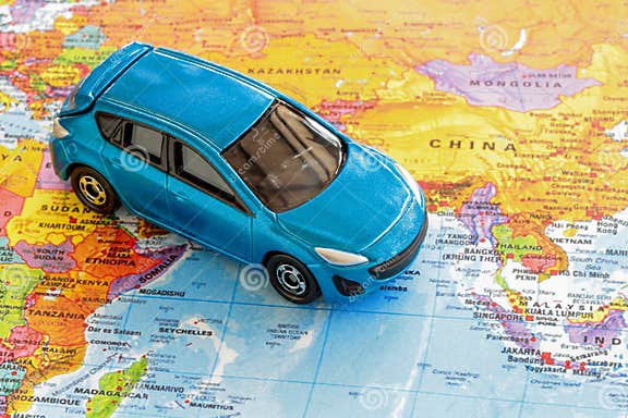 Car on world map stock photo. Image of drive, miniature - 83252030
