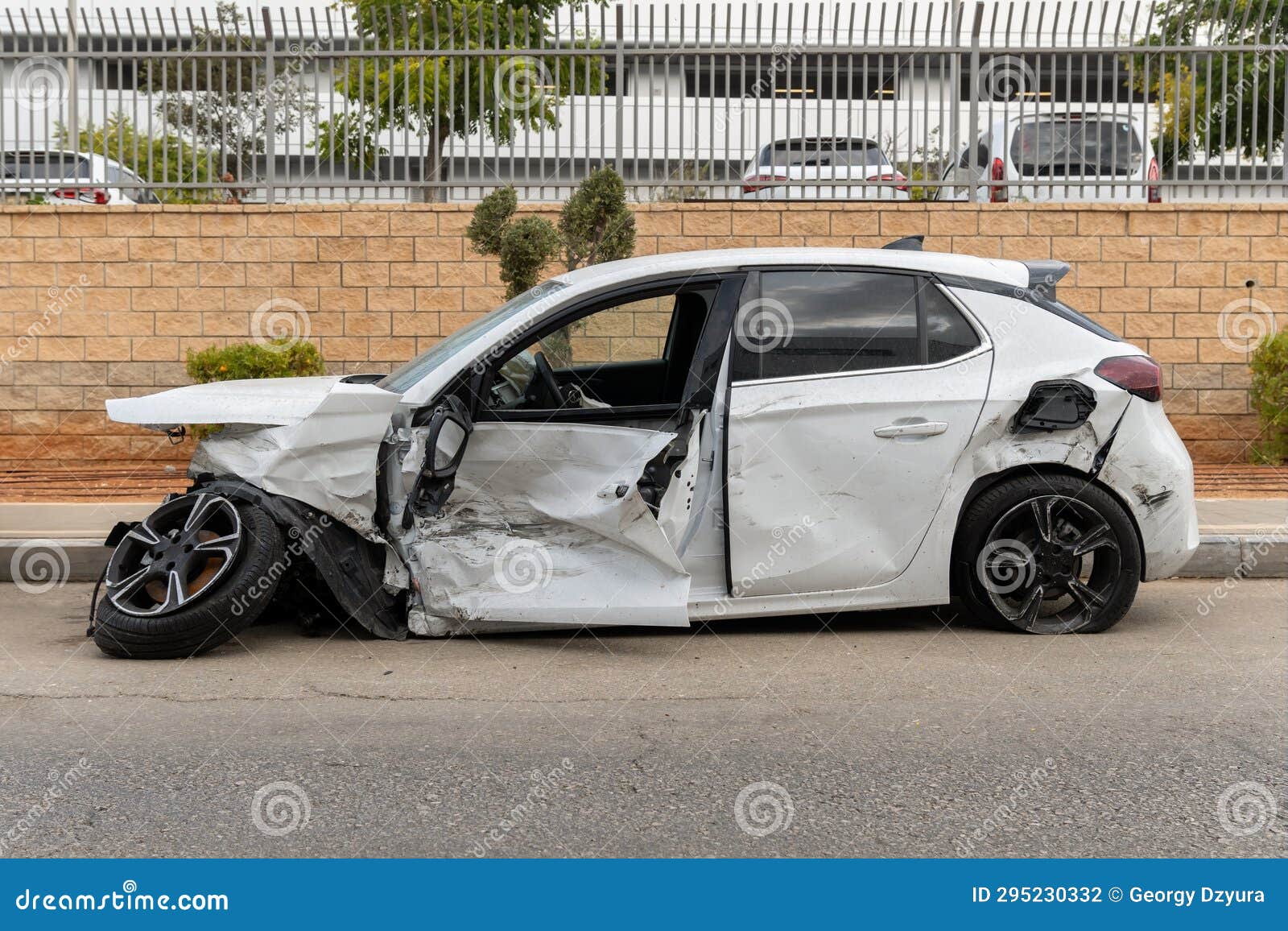 Car Wrecked in an Accident with a Wheel Torn Off Stock Photo - Image of ...