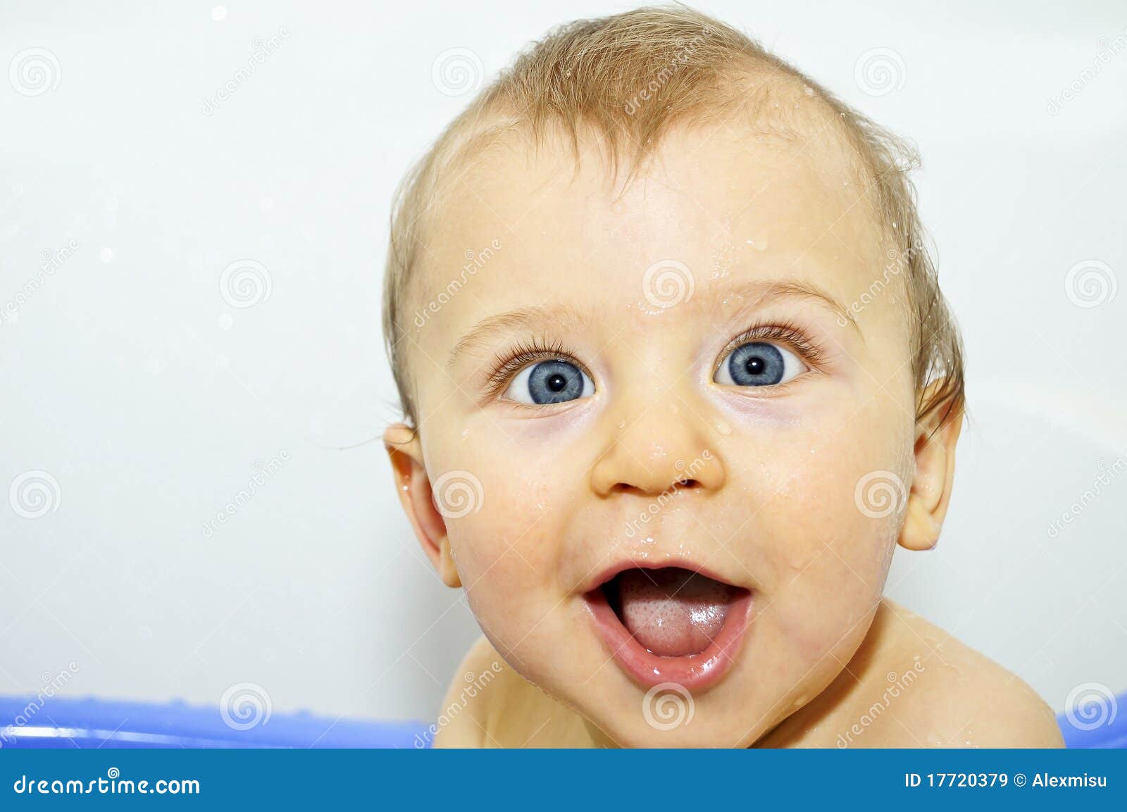 Cara feliz del bebé imagen de archivo. Imagen de azul - 17720379