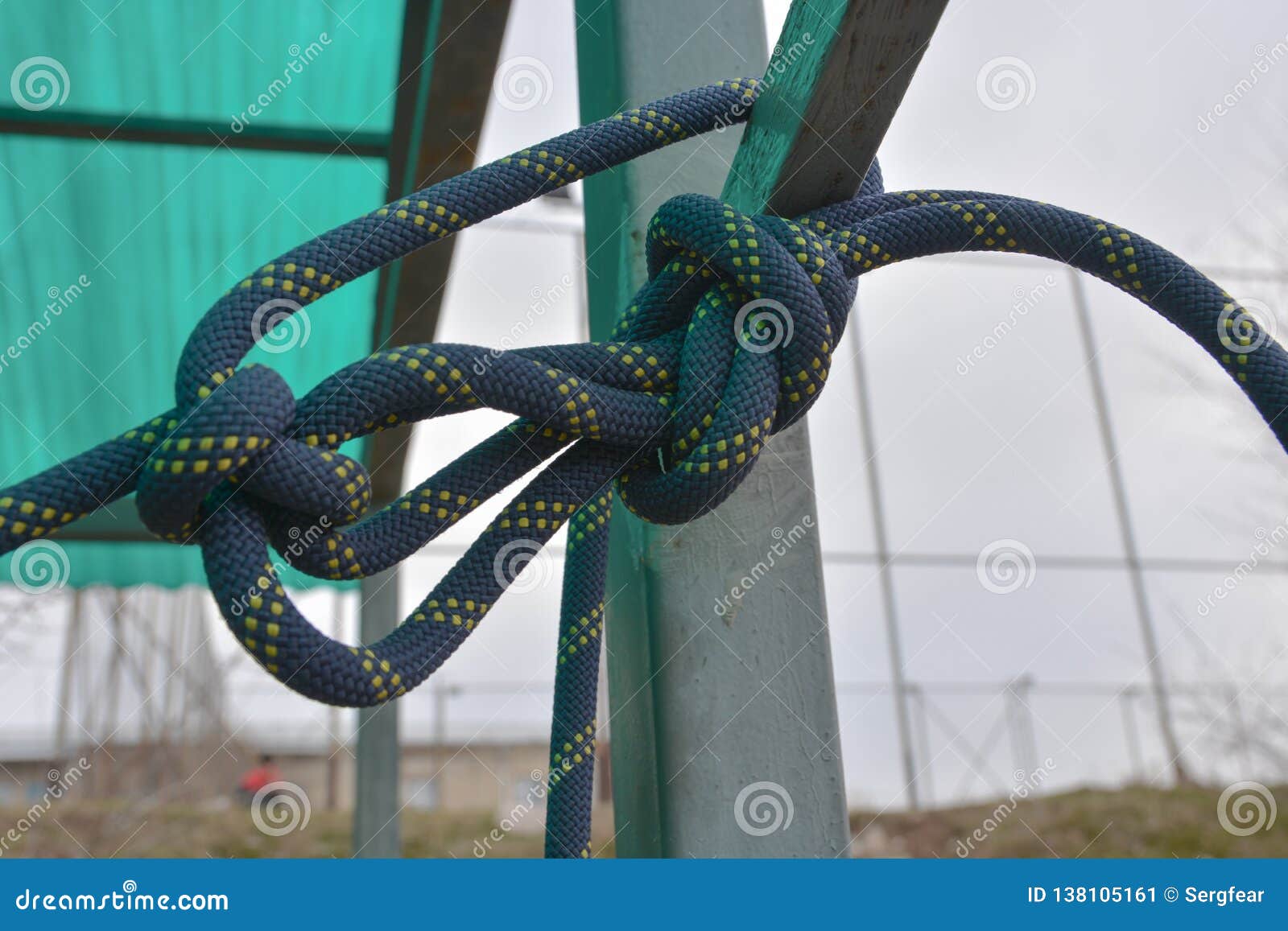 Carabine and Climbing Rope in Knot. Climbing Equipment Stock Image ...