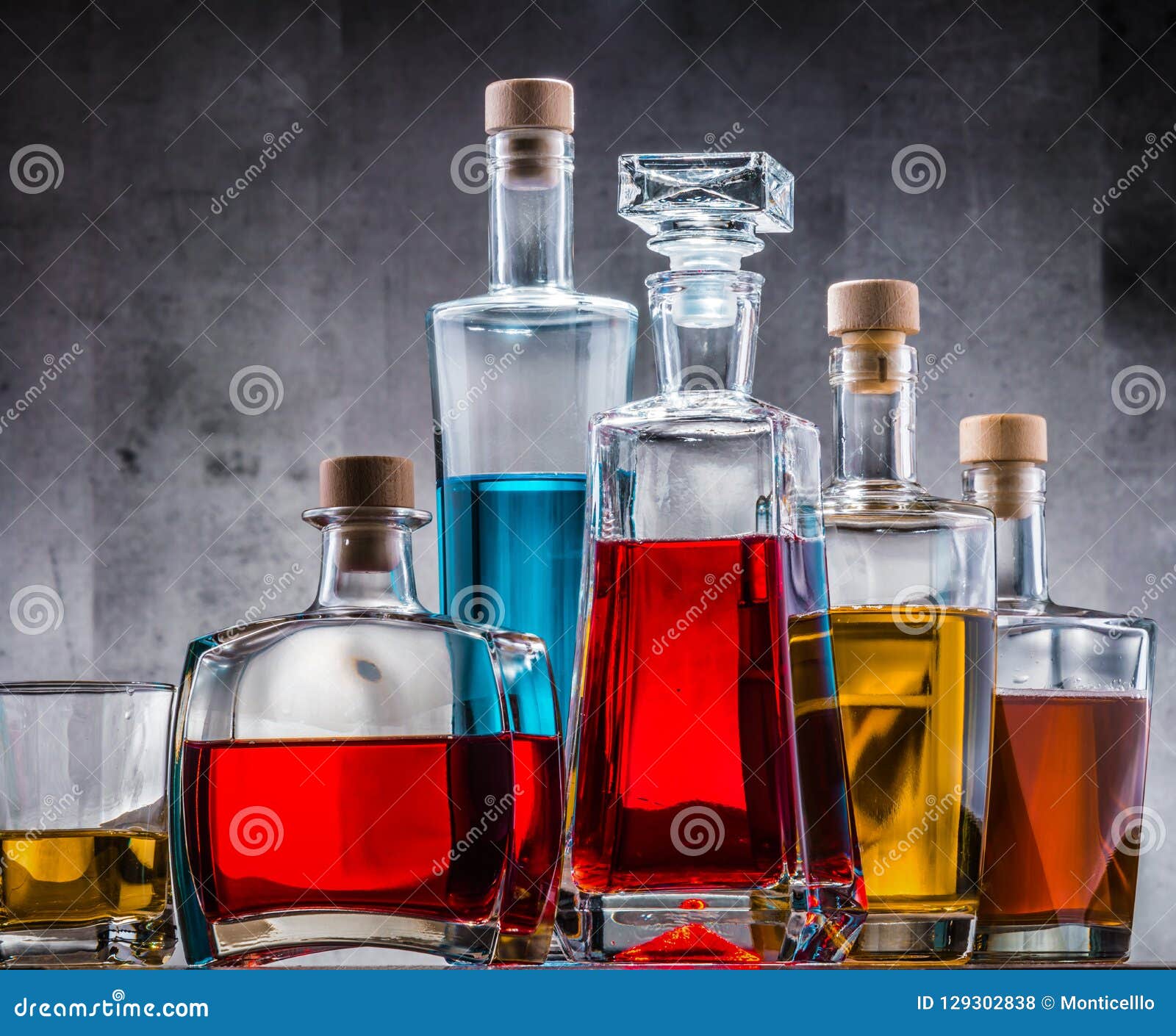 Carafe and Bottles of Assorted Alcoholic Beverages. Stock Photo - Image ...