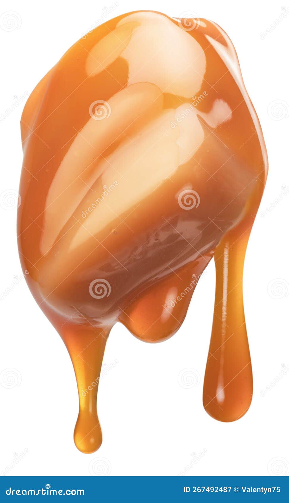 Caramel Candy and Drops of Milk Caramel Sauce Flowing Down from it ...
