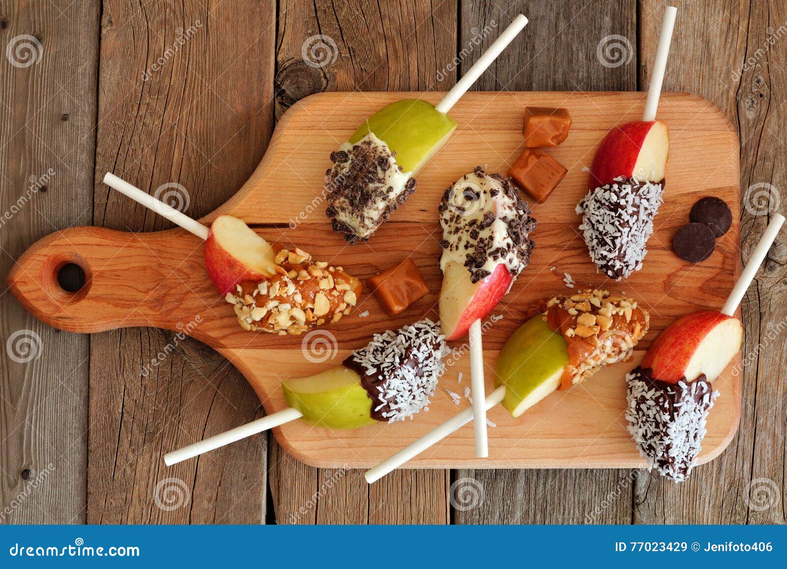 Caramel and Chocolate Dipped Apple Slices on a Paddle Board Stock Image ...