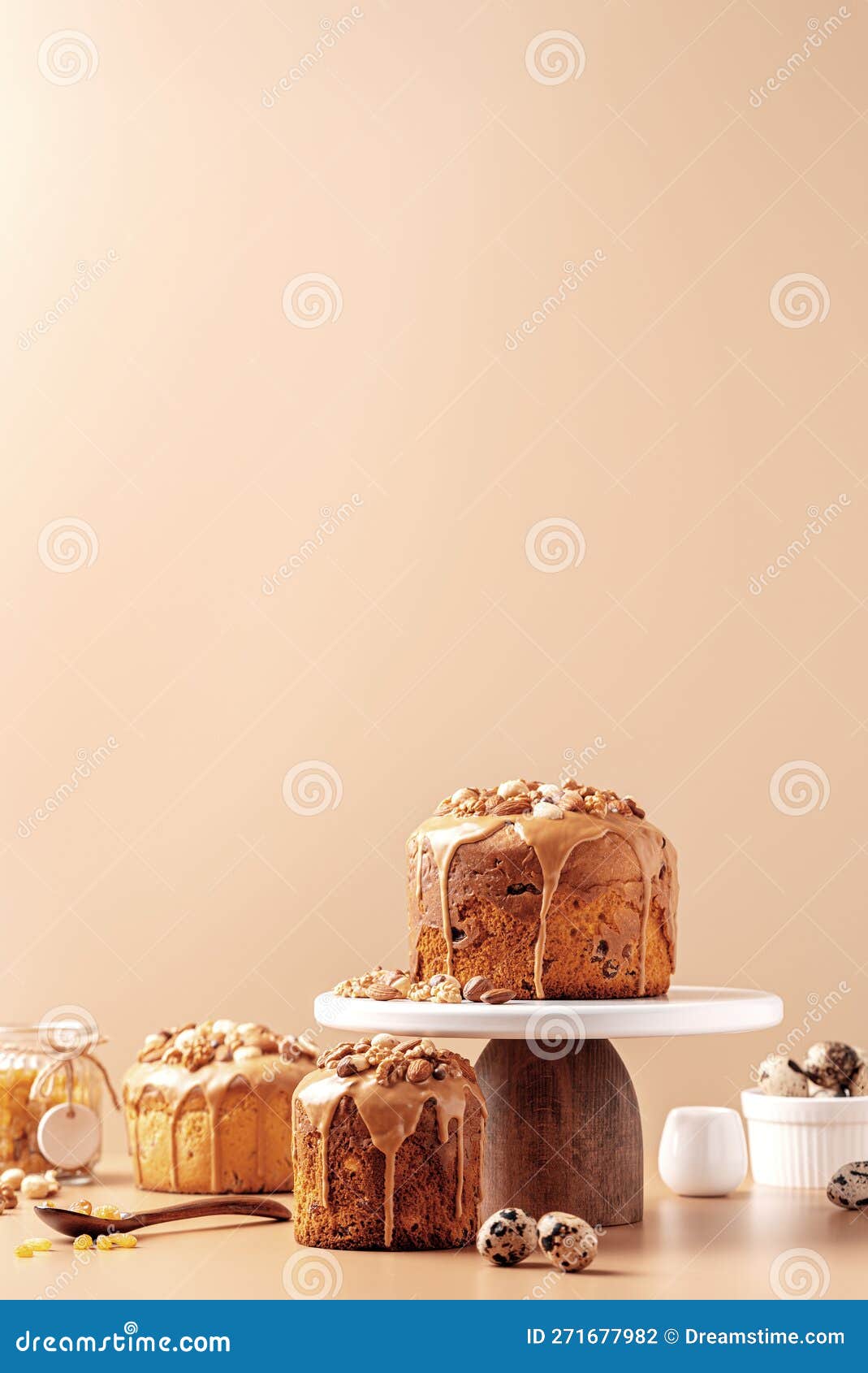 Caramel Glazed Easter Cakes Decorated with Nuts on Pastel Background ...