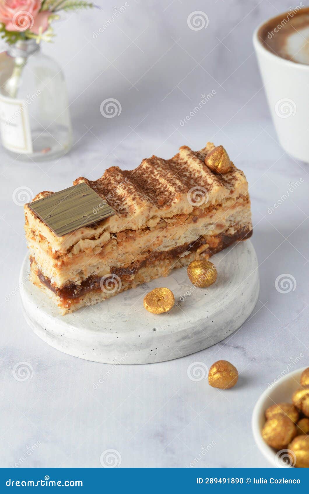 Caramel and Hazelnut Cake, Dacquoise Cake on Bright Background Stock ...