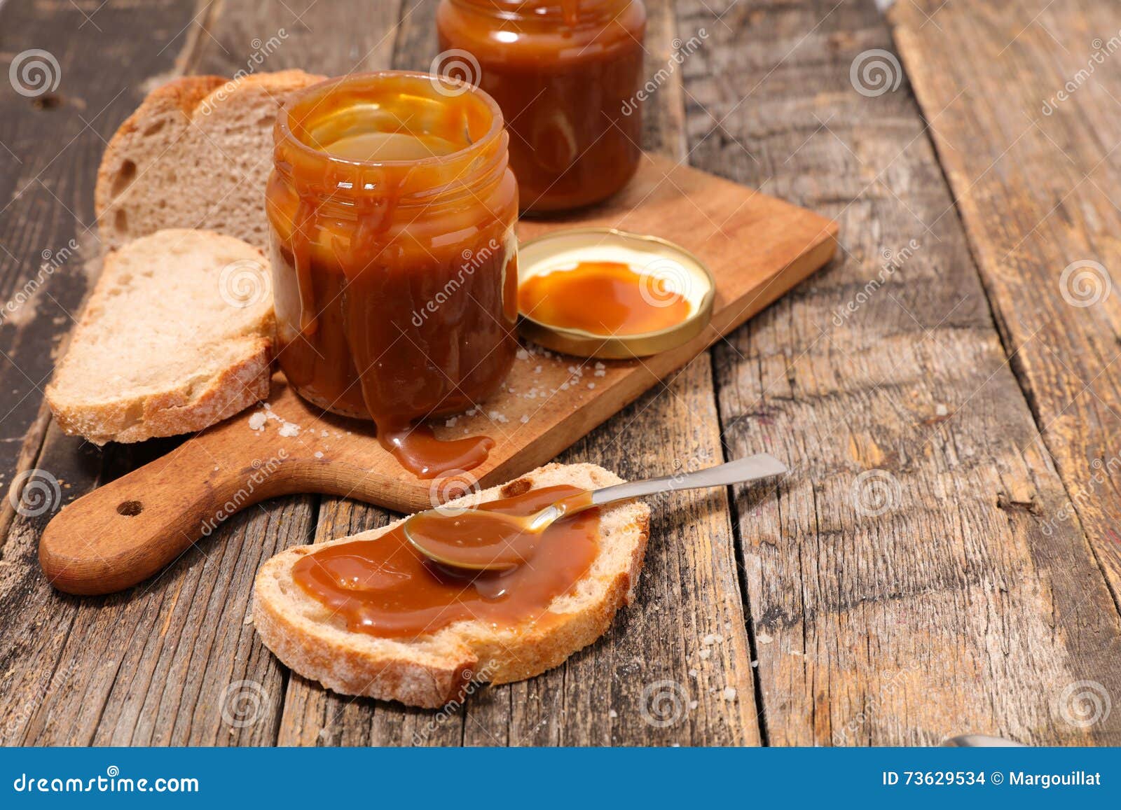 Caramel in jar stock photo. Image of wood, caramel, homemade - 73629534