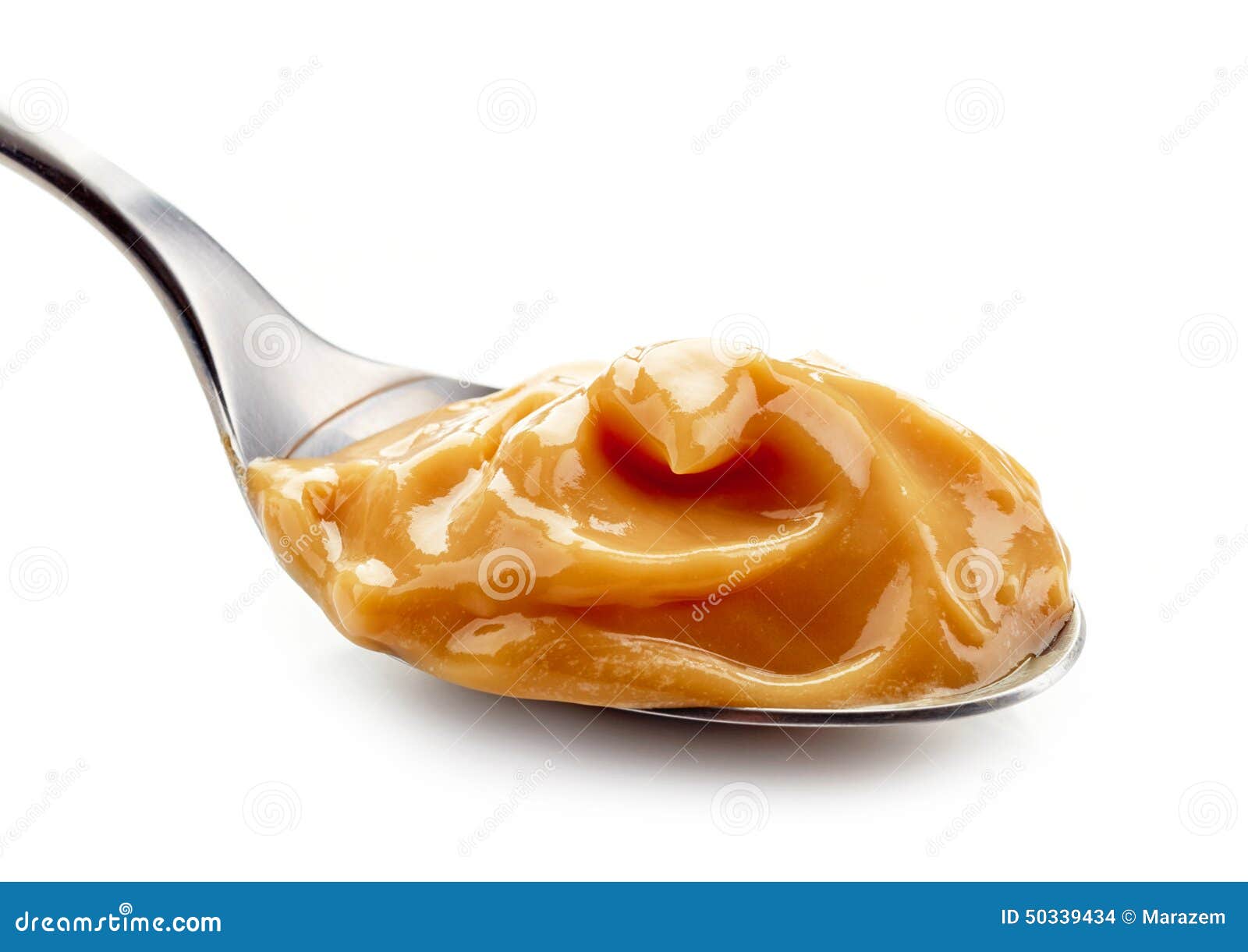 Caramel pudding in a spoon stock photo. Image of sugar - 50339434
