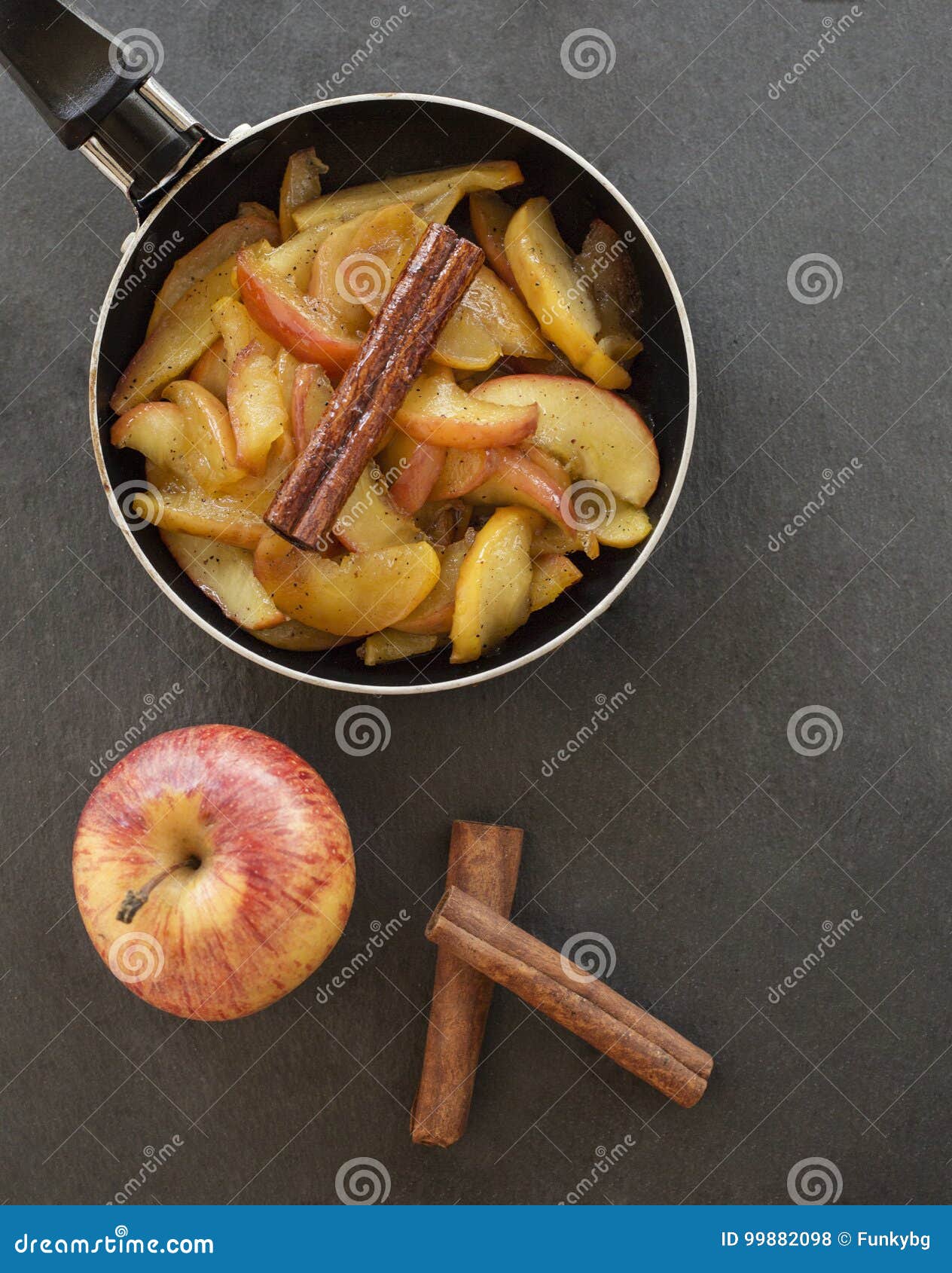 Caramelized apples in pan stock photo. Image of oven - 99882098